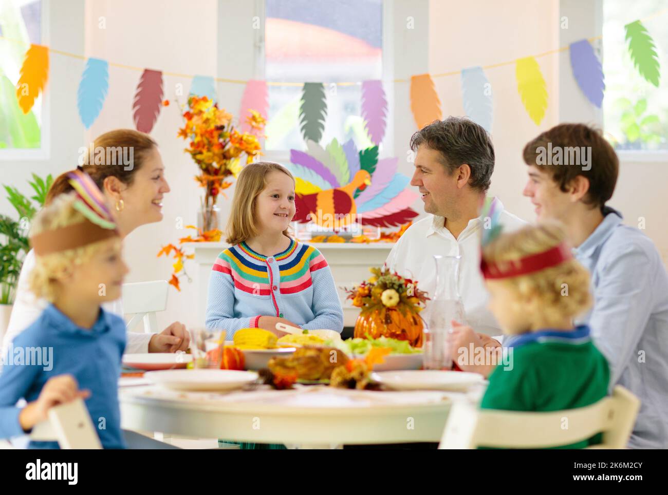 Children eating turkey thanksgiving celebration hi-res stock ...