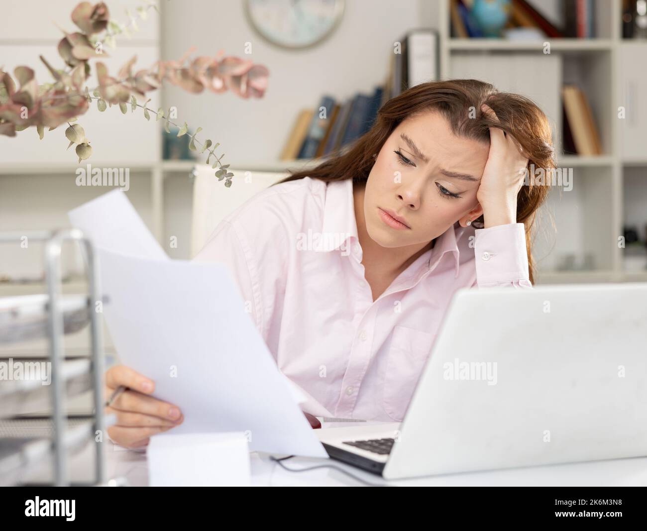 Portrait of tired woman accountant Stock Photo - Alamy