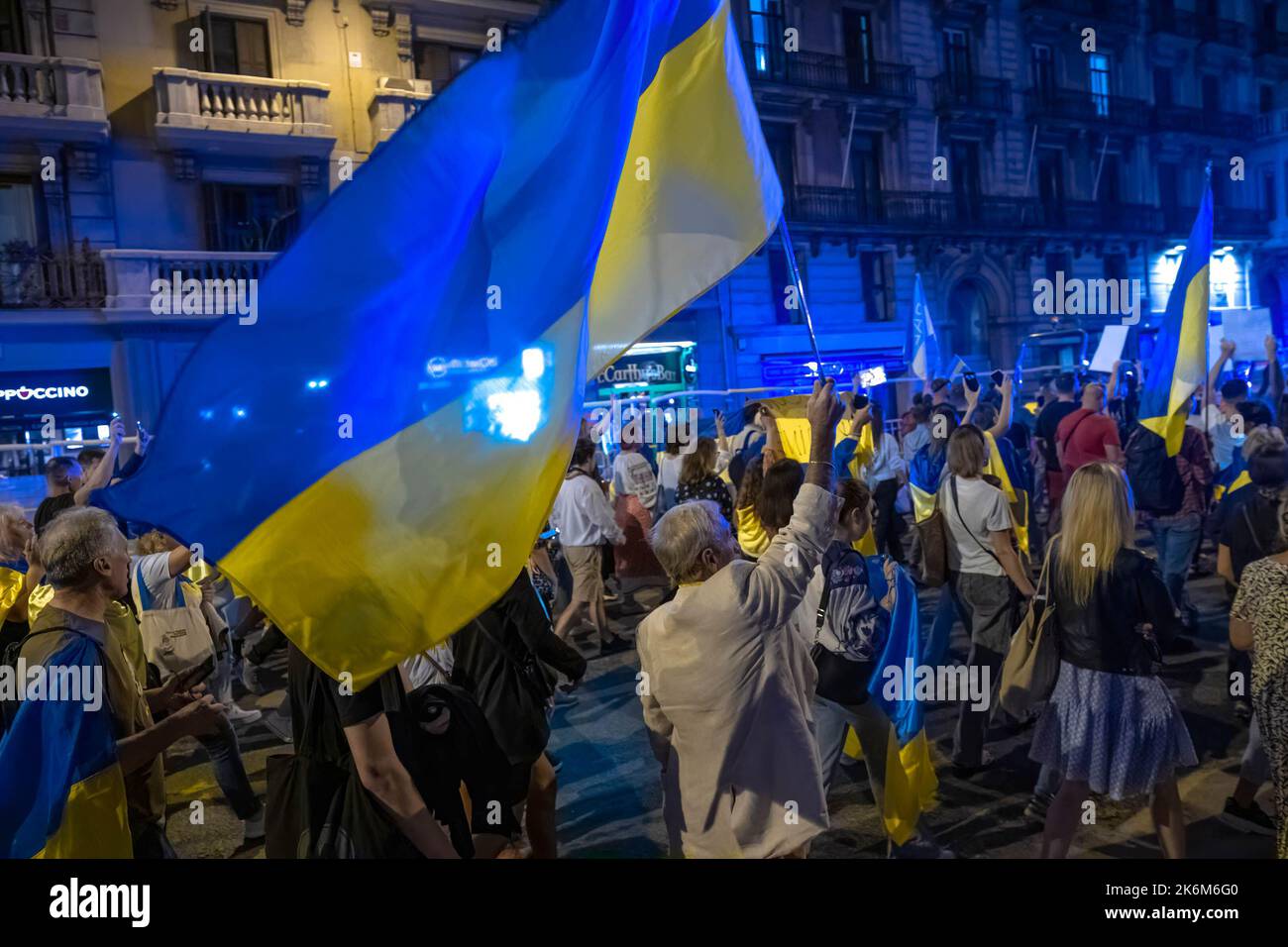 Barcelona, Spain. 14th Oct, 2022. Protesters are seen holding Ukrainian ...