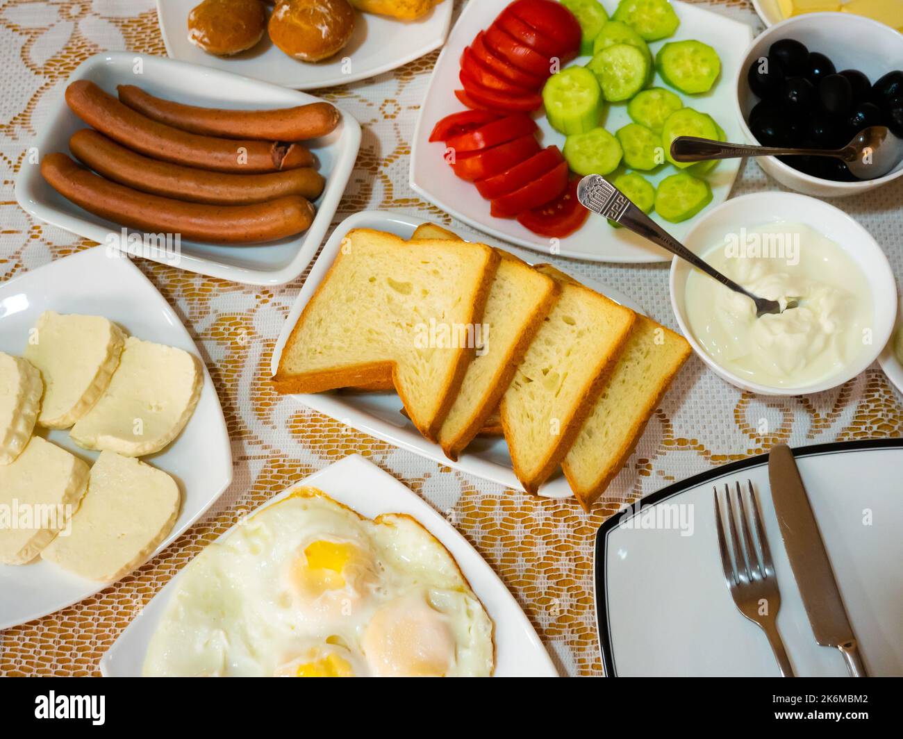 Breakfast in Georgian hotel with fried eggs, cheese, vegetables Stock ...