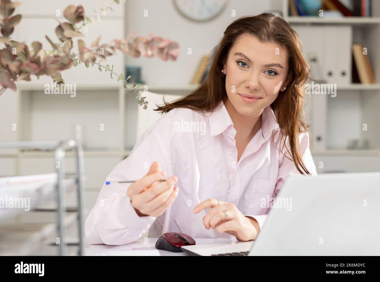 Successful business woman using laptop at workplace in office Stock ...