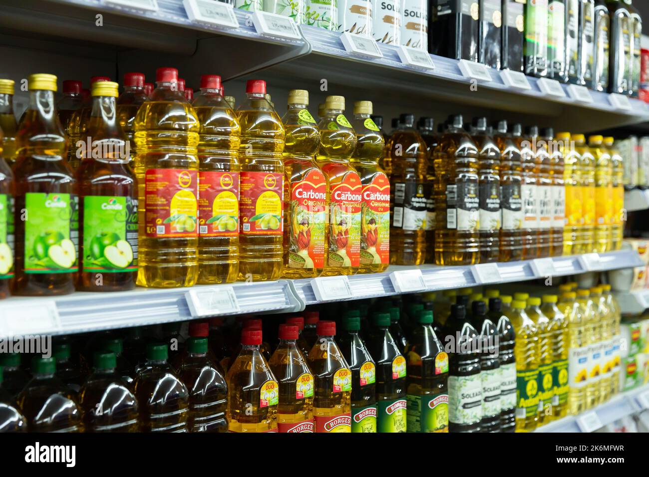 Assortment of oil in supermarket Stock Photo - Alamy