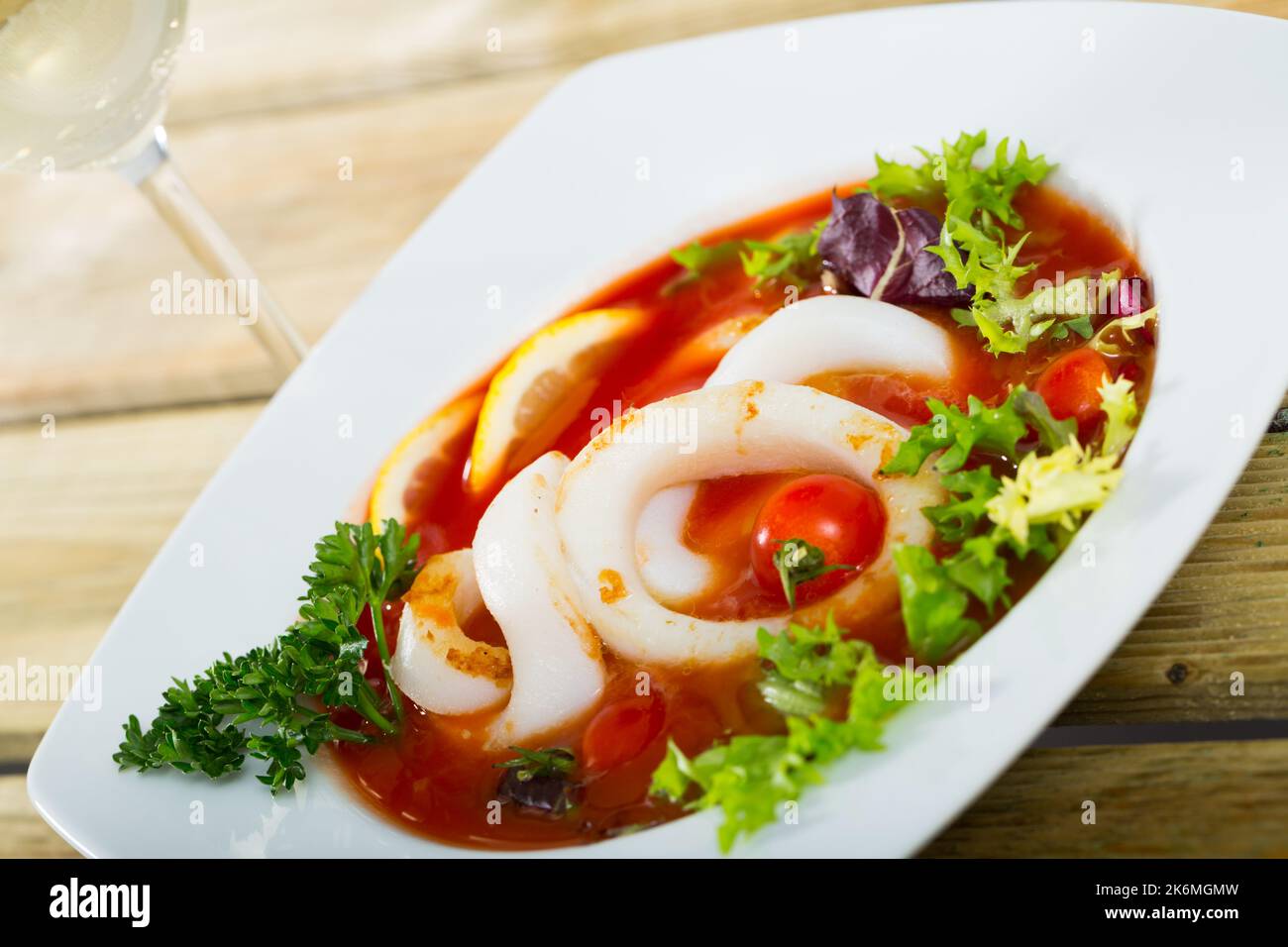 Image of tomato soup with squid Stock Photo - Alamy