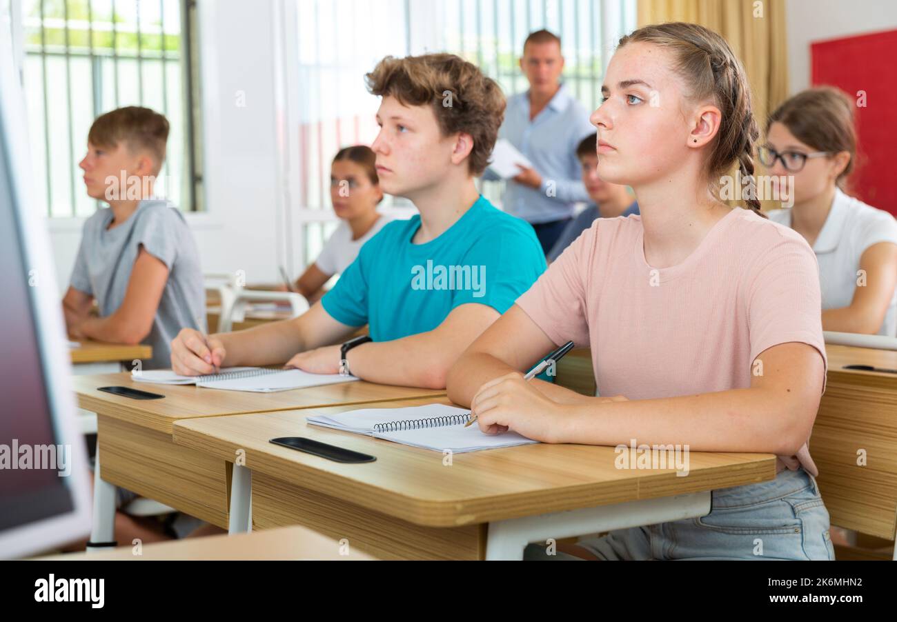 Student is sitting test and answer about task in classroom Stock Photo ...