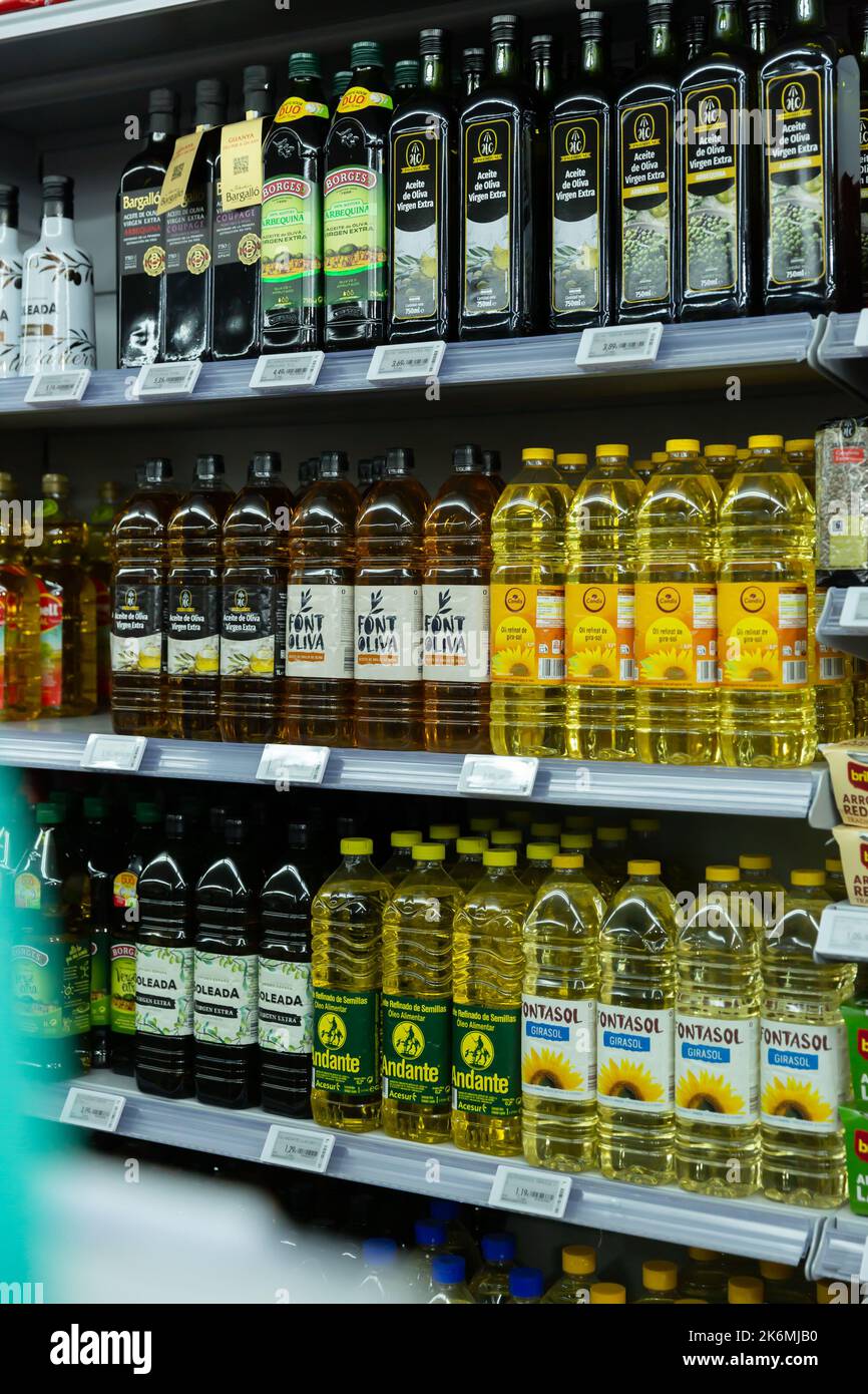 Bottles of olive oil in supermarket Stock Photo - Alamy