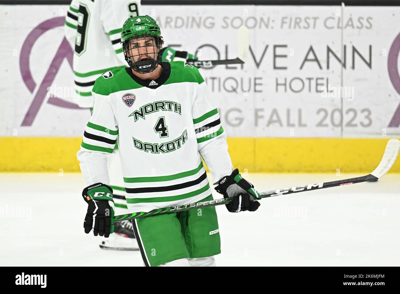 North Dakota Fighting Hawks defenseman Cooper Moore (4) warms up prior ...