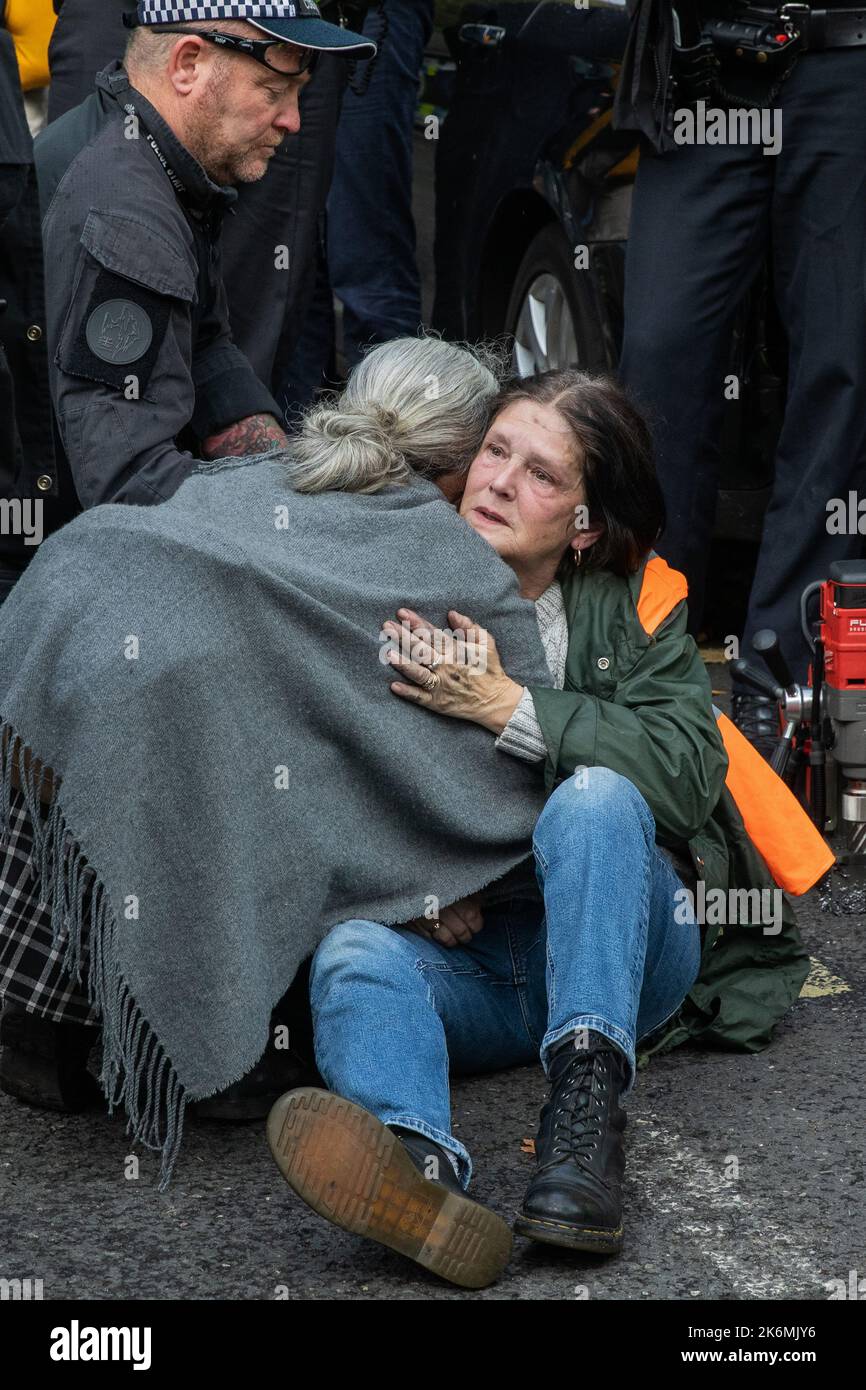 London, UK. 14th October, 2022. A climate activist from Just Stop Oil ...