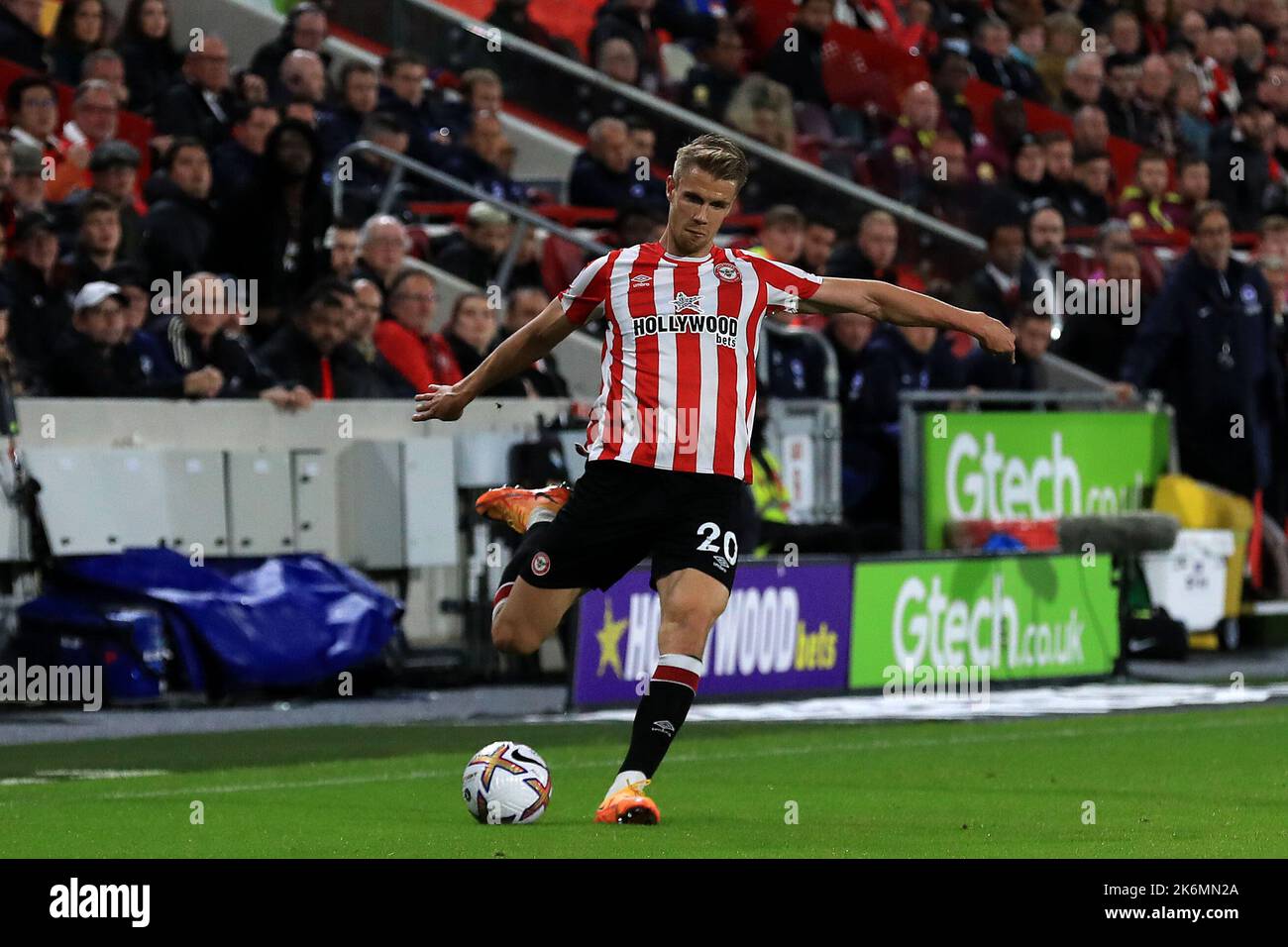 Kristoffer Ajer #20 of Brentford crossing the ball during the Premier ...