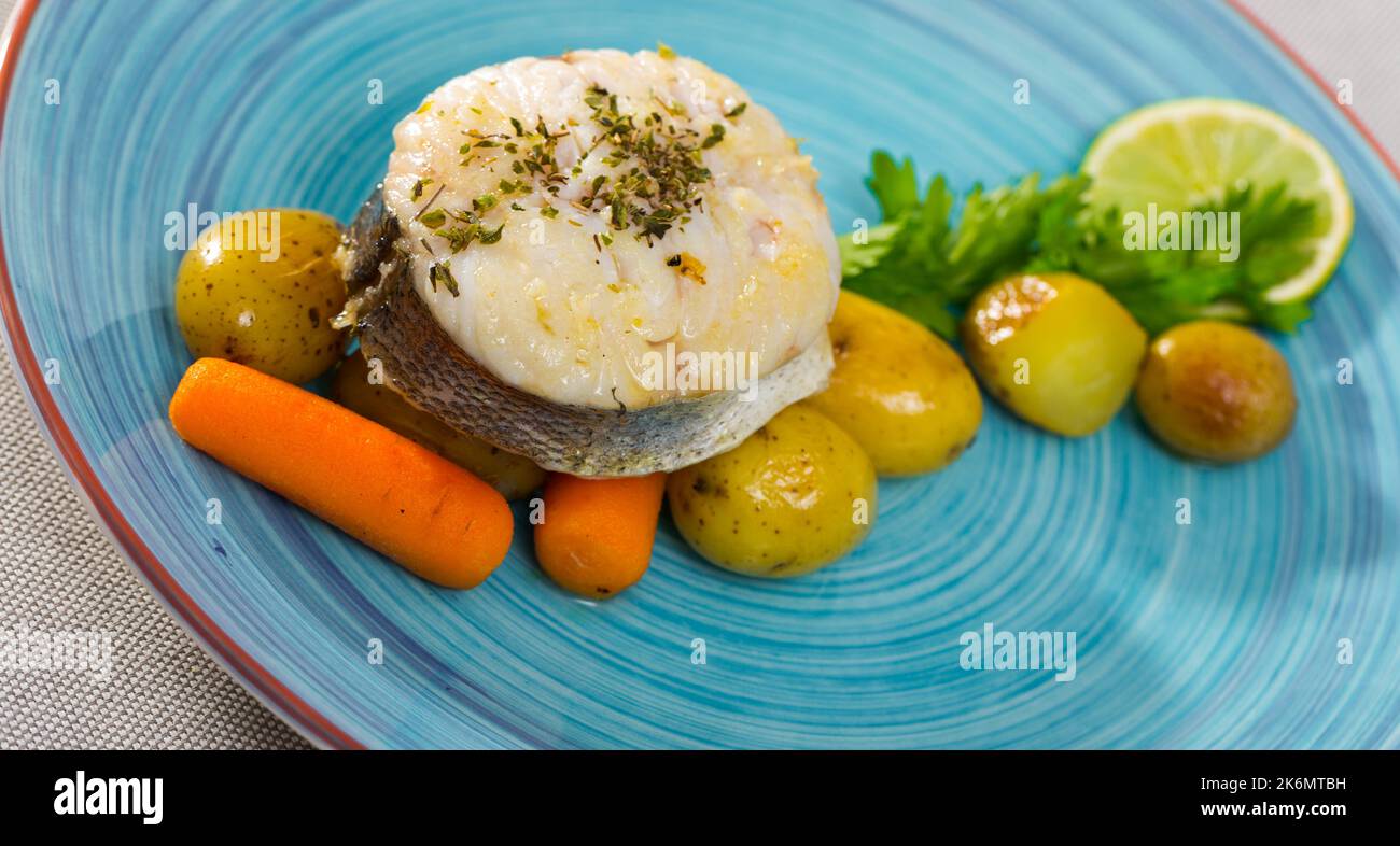 Pollock steak with vegetables Stock Photo - Alamy