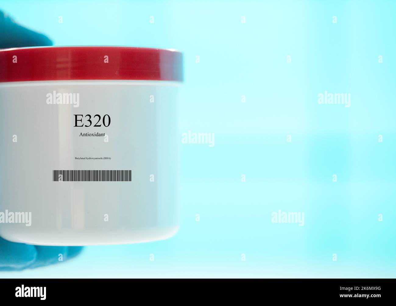 Container of the food additive E320 Stock Photo - Alamy