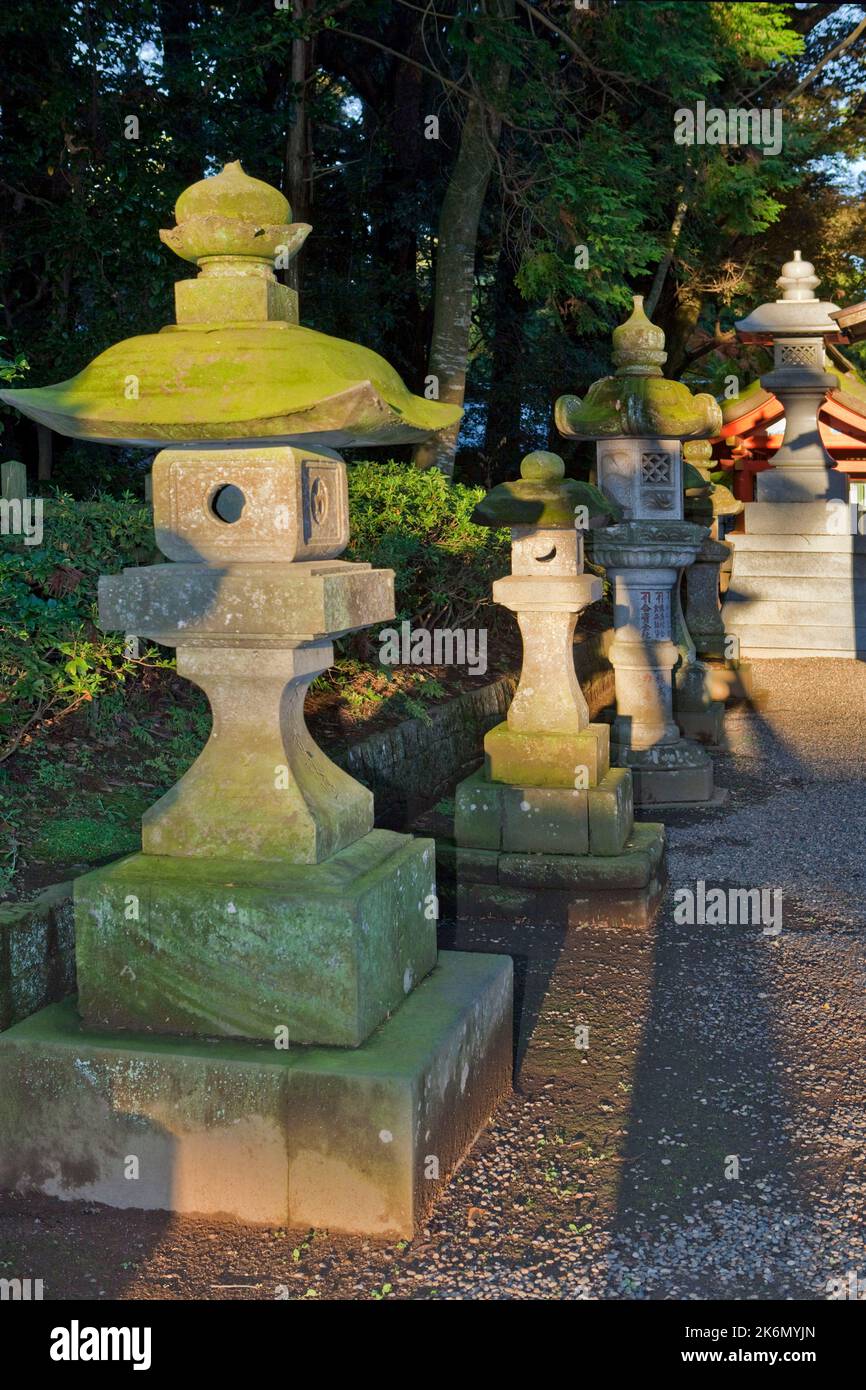 Row of stone lanterns shrine Kashima Japan 2 Stock Photo - Alamy
