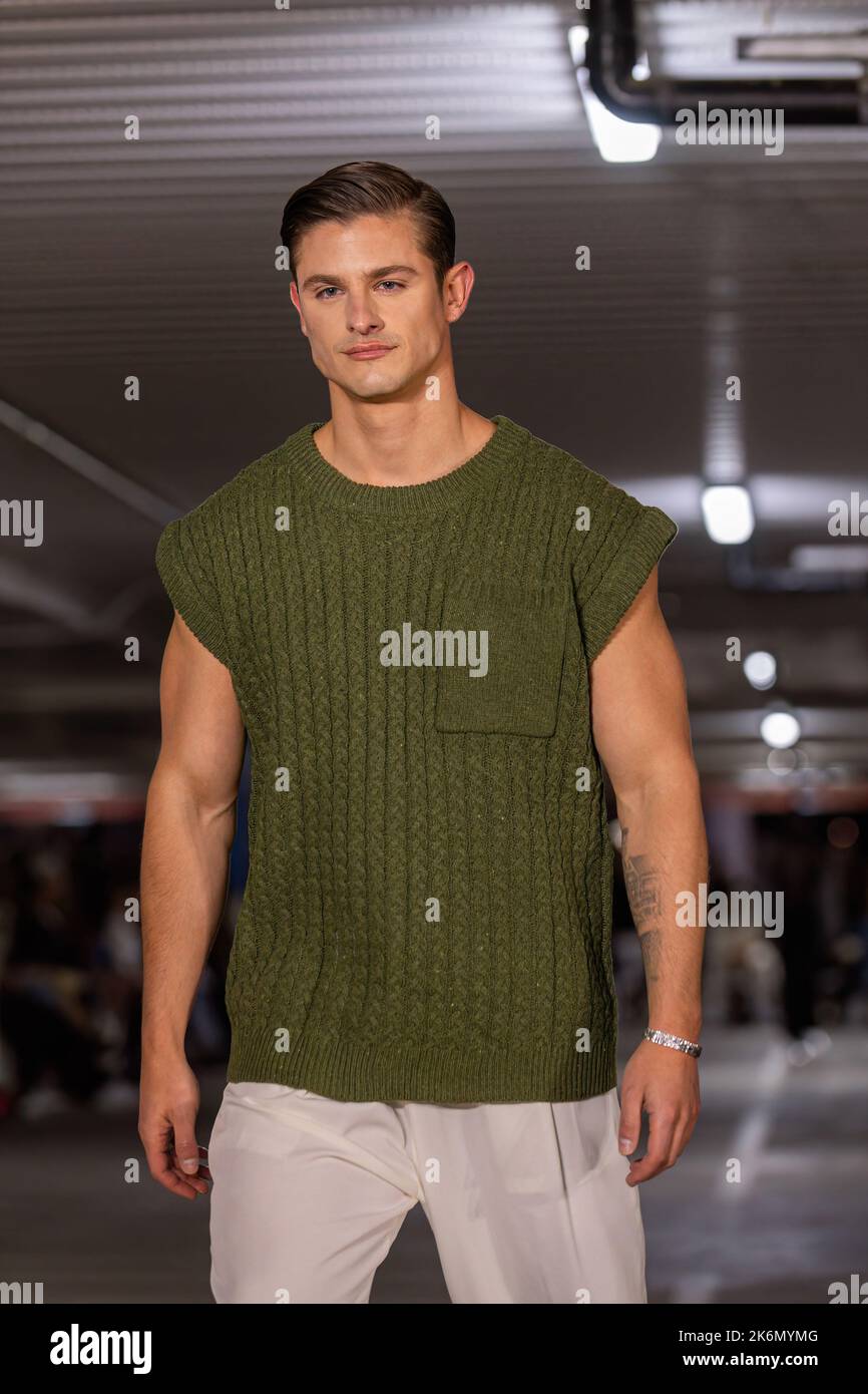 Melbourne, Australia. 14th Oct, 2022. A male model walks the runway at ...