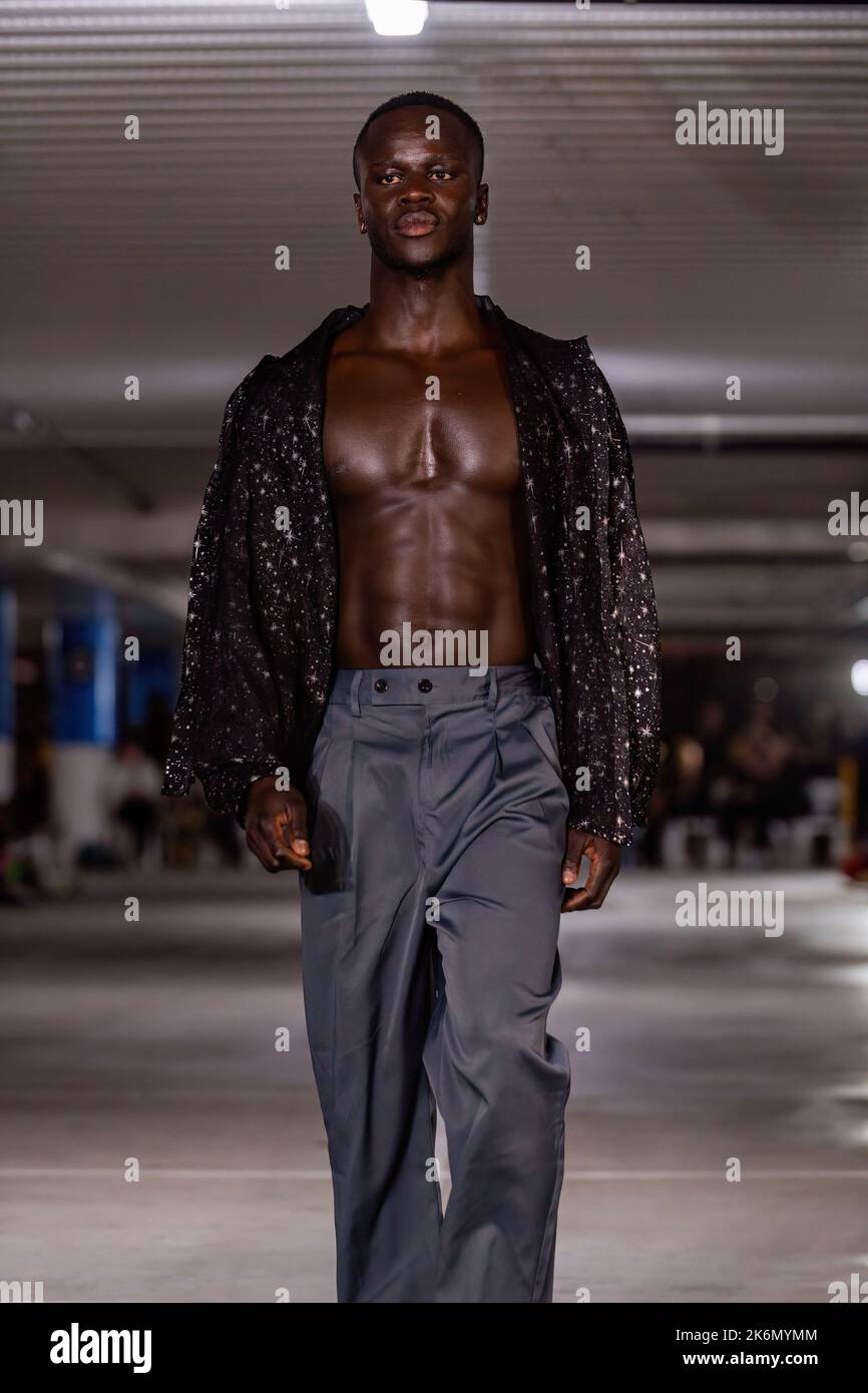 Melbourne, Australia. 14th Oct, 2022. A male model walks the runway at ...