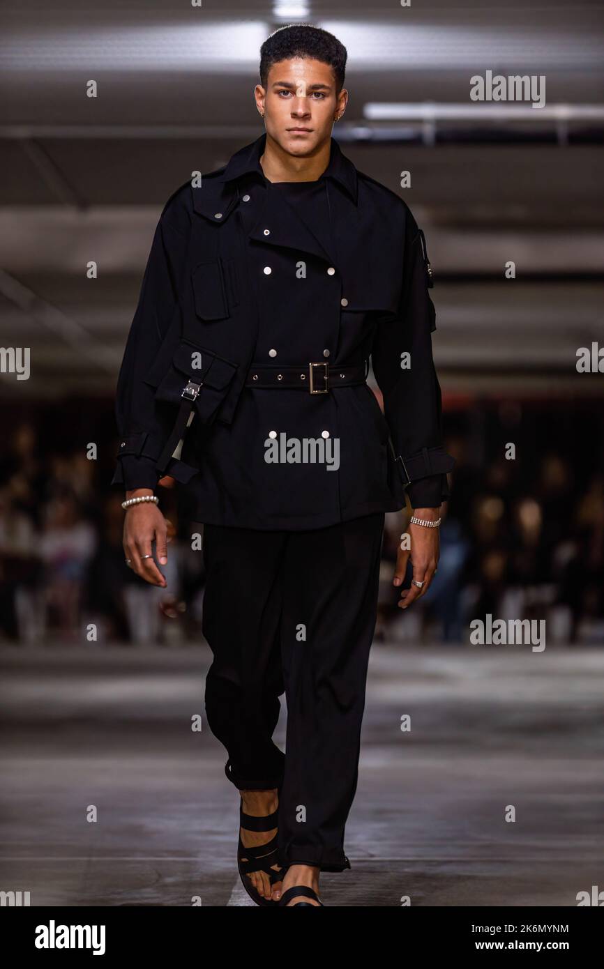 Melbourne, Australia. 14th Oct, 2022. A male model walks the runway at ...
