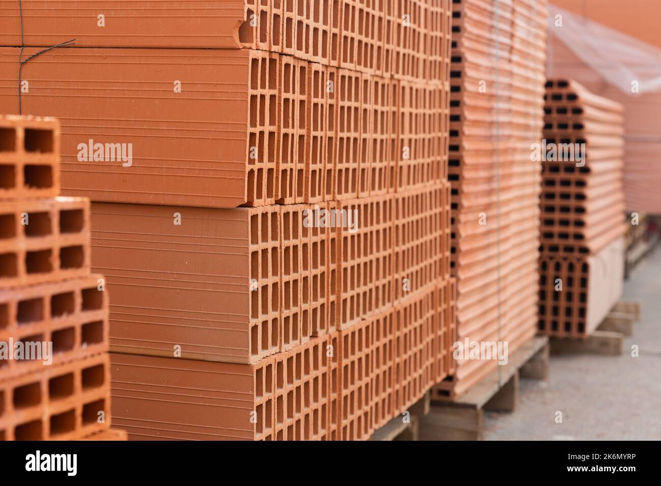 Pallets with bricks in a warehouse of brick factory Stock Photo - Alamy
