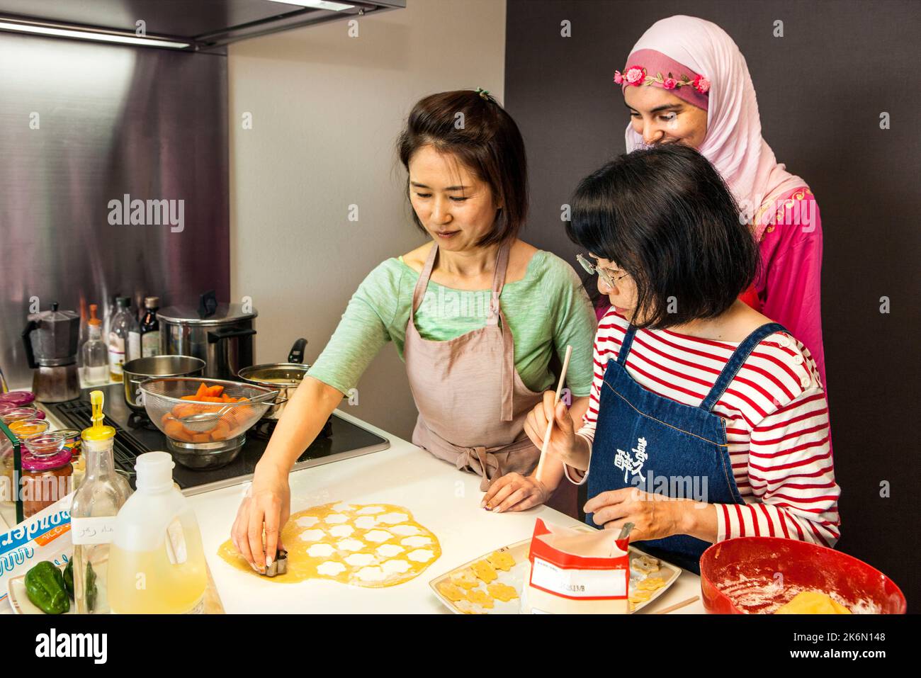 Students and teachers make donuts, yuyu, Tunisian cooking class in ...