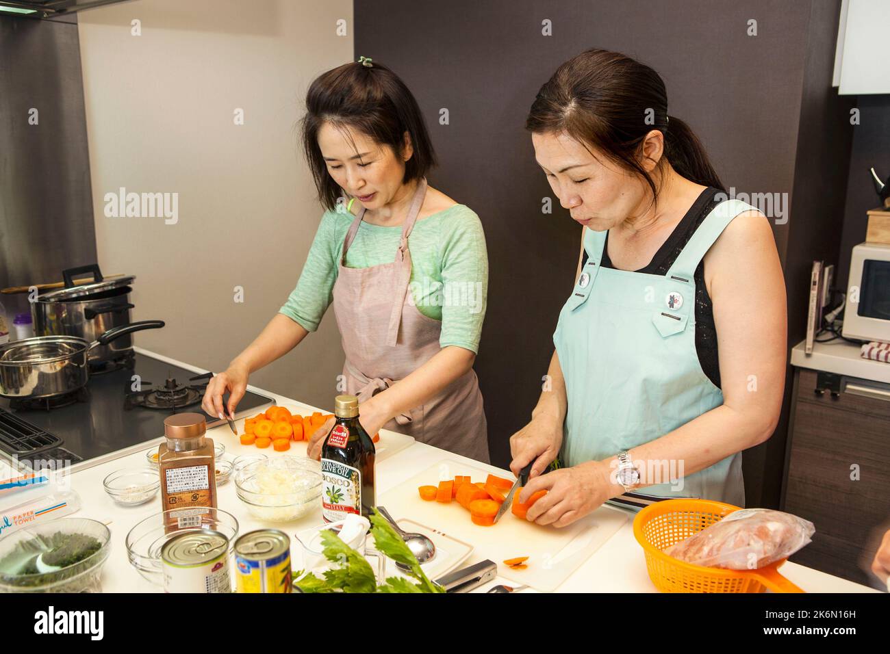 Students prepare meal at Tunisian cooking class, Shibaura, Tokyo, Japan ...