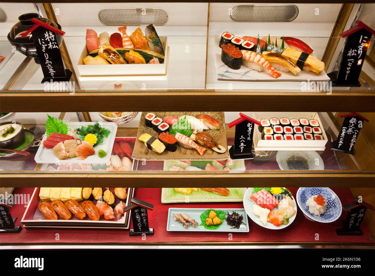 Sushi display restaurant Tokyo Japan Stock Photo - Alamy