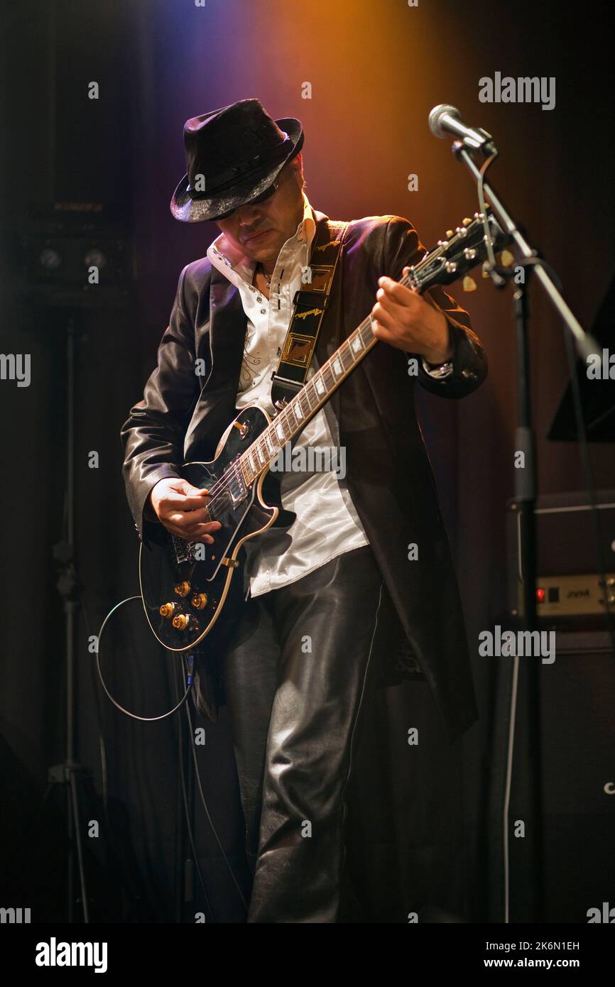 Rock and roll guitarist performs in club in Tokyo Japan Stock Photo - Alamy