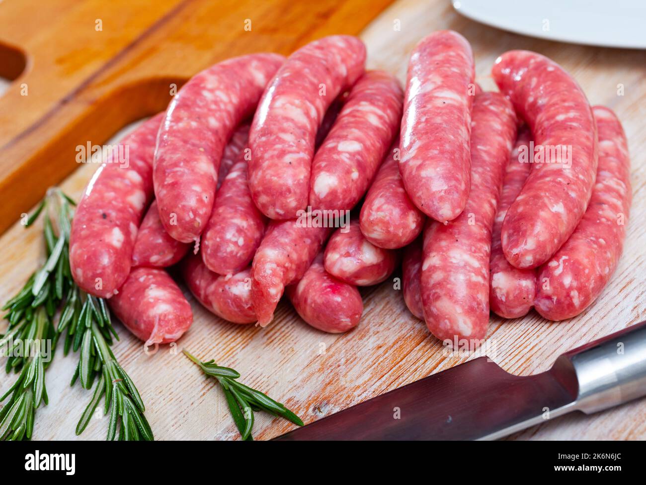 Raw meat sausages for frying Stock Photo - Alamy