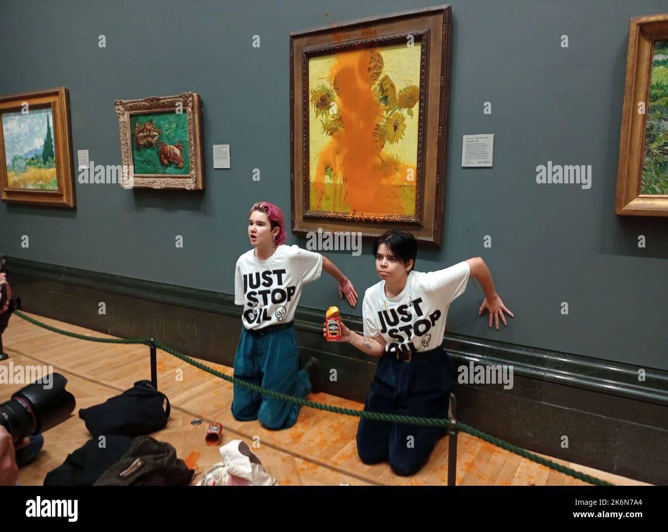 London, England, UK. 14th Oct, 2022. Just Stop Oil protesters glued ...