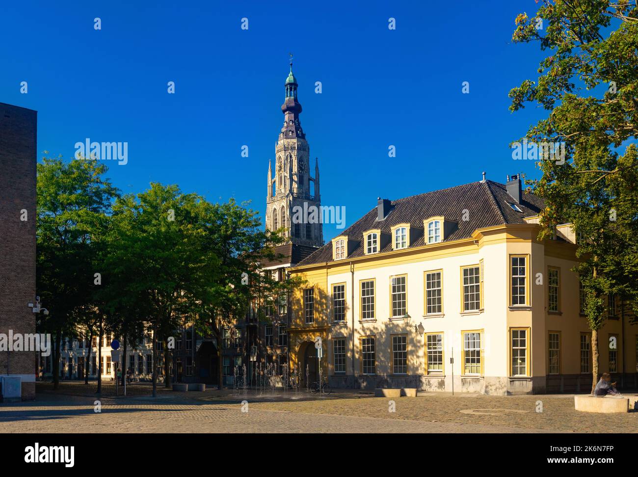 Streets of Breda, view of Grote Kerk tower Stock Photo - Alamy