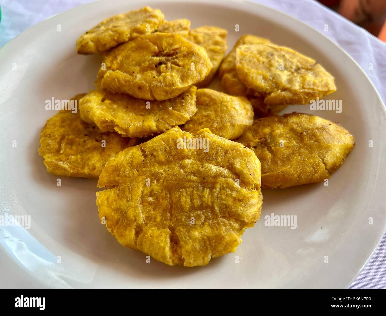 Caribbean food, slices of banana fried Stock Photo - Alamy