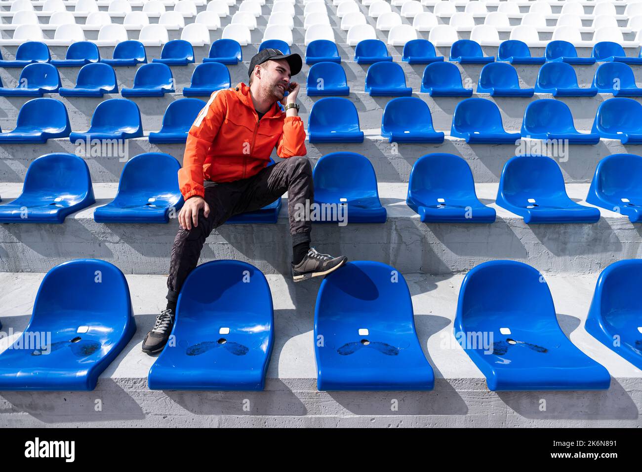 Football fan clapping on the podium of the stadium. one single fan at ...