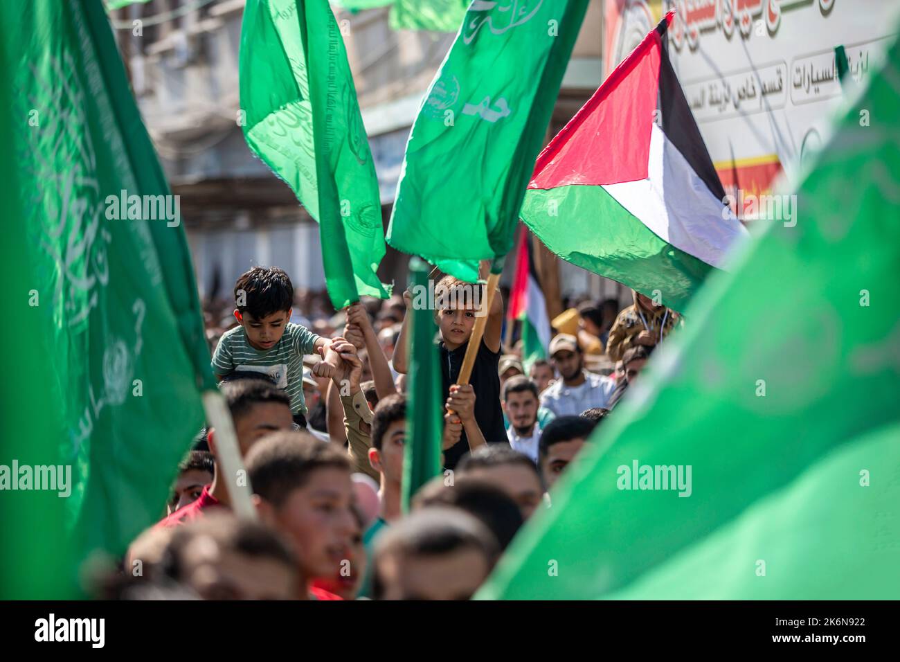 Supporters of the Palestinian Hamas movement wave green flags during a ...