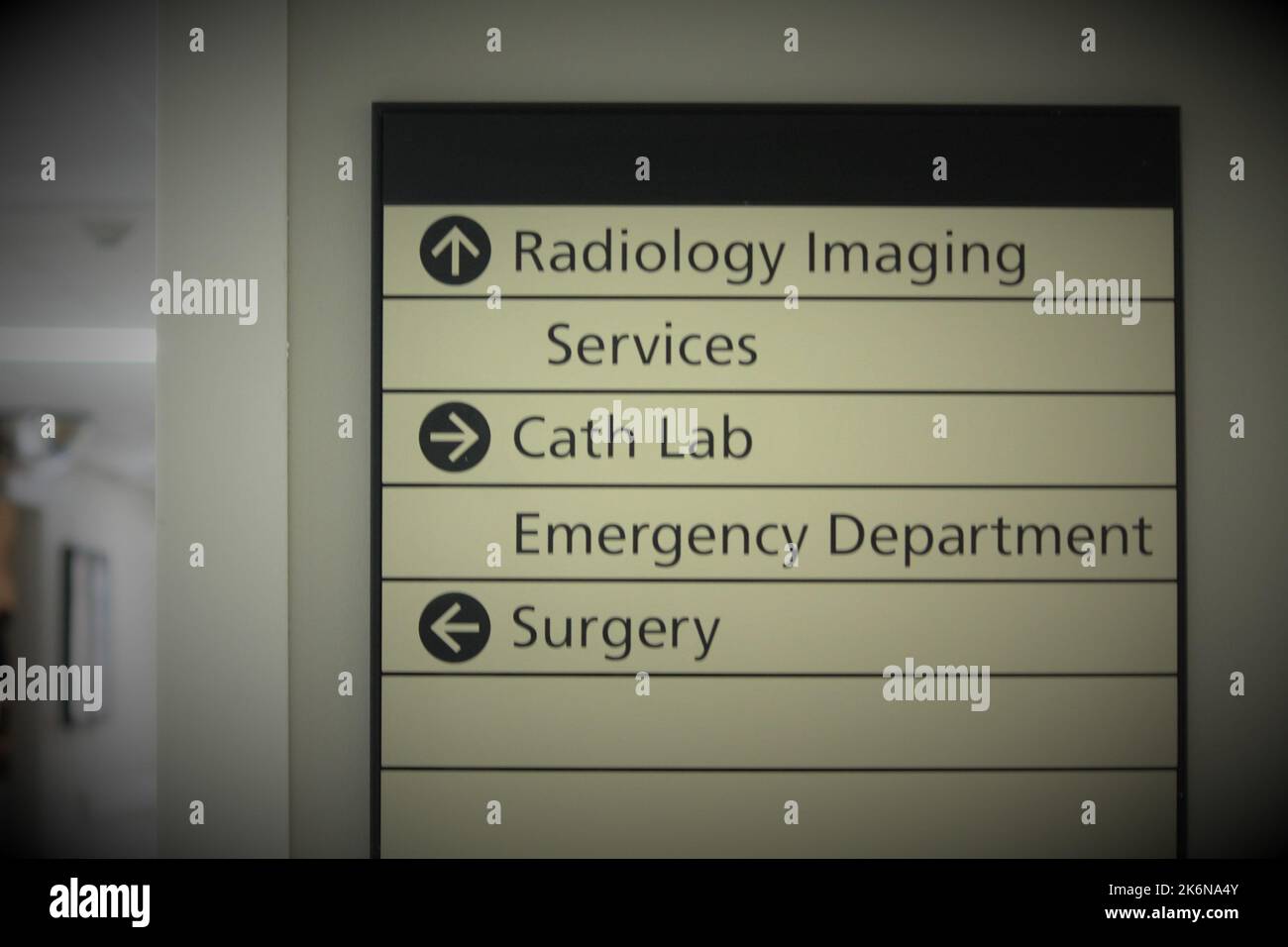 Directional sign in a hospital hallway, directing patients to radiology ...