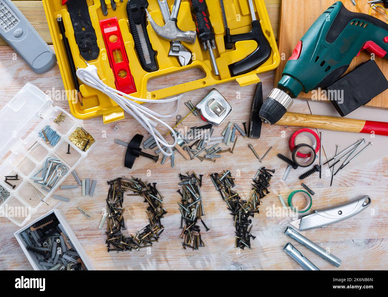 Word DIY lined with screws among hand tools Stock Photo - Alamy