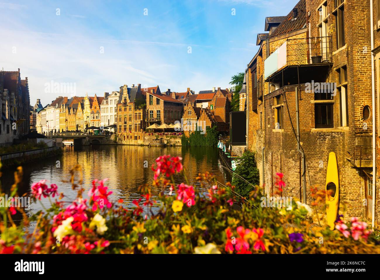 Cityscape of Ghent with traditional Flemish townhouses on banks of Leie ...