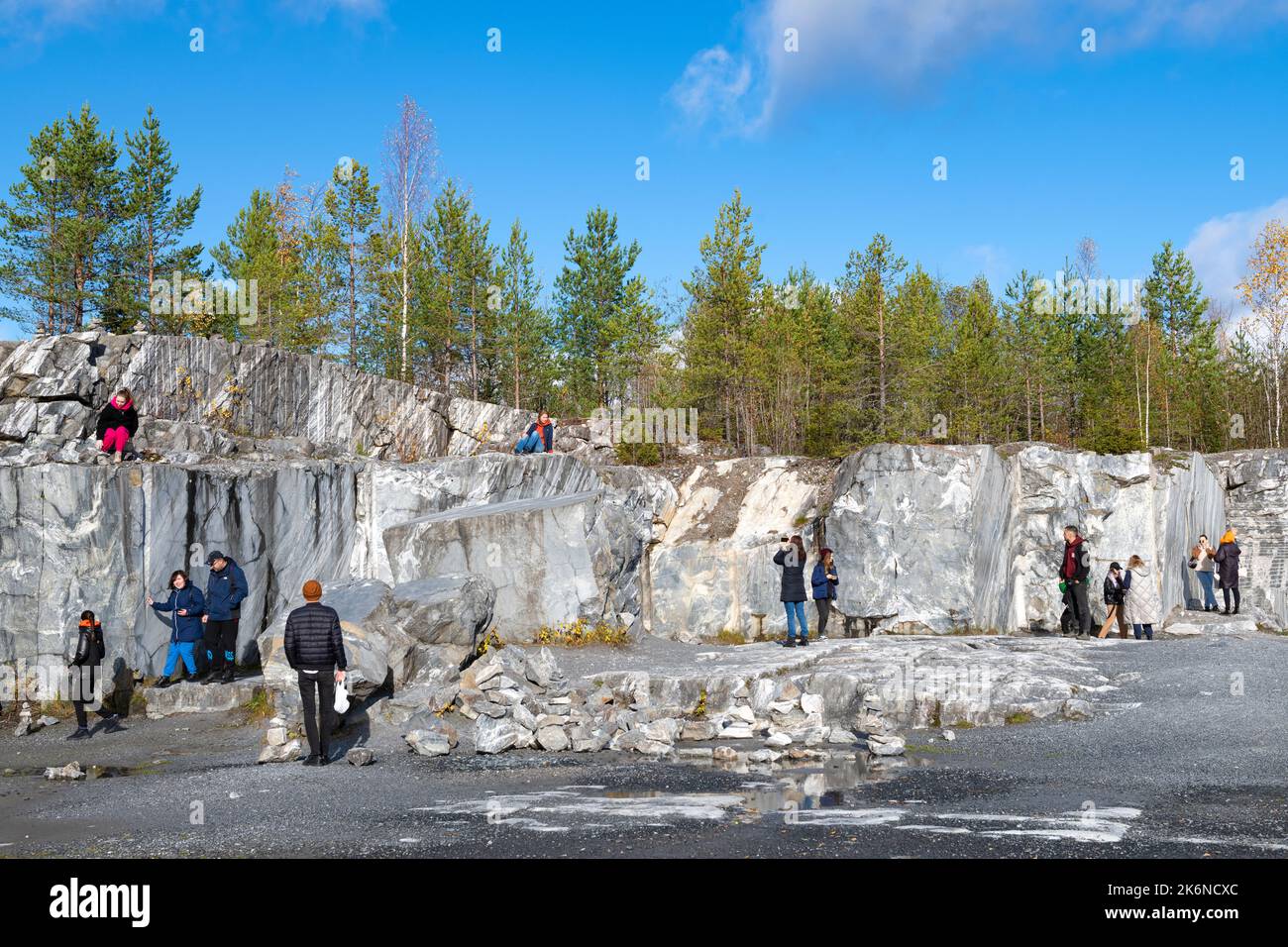 RUSKEALA, RUSSIA - OCTOBER 09, 2022: Tourists in an old marble quarry ...