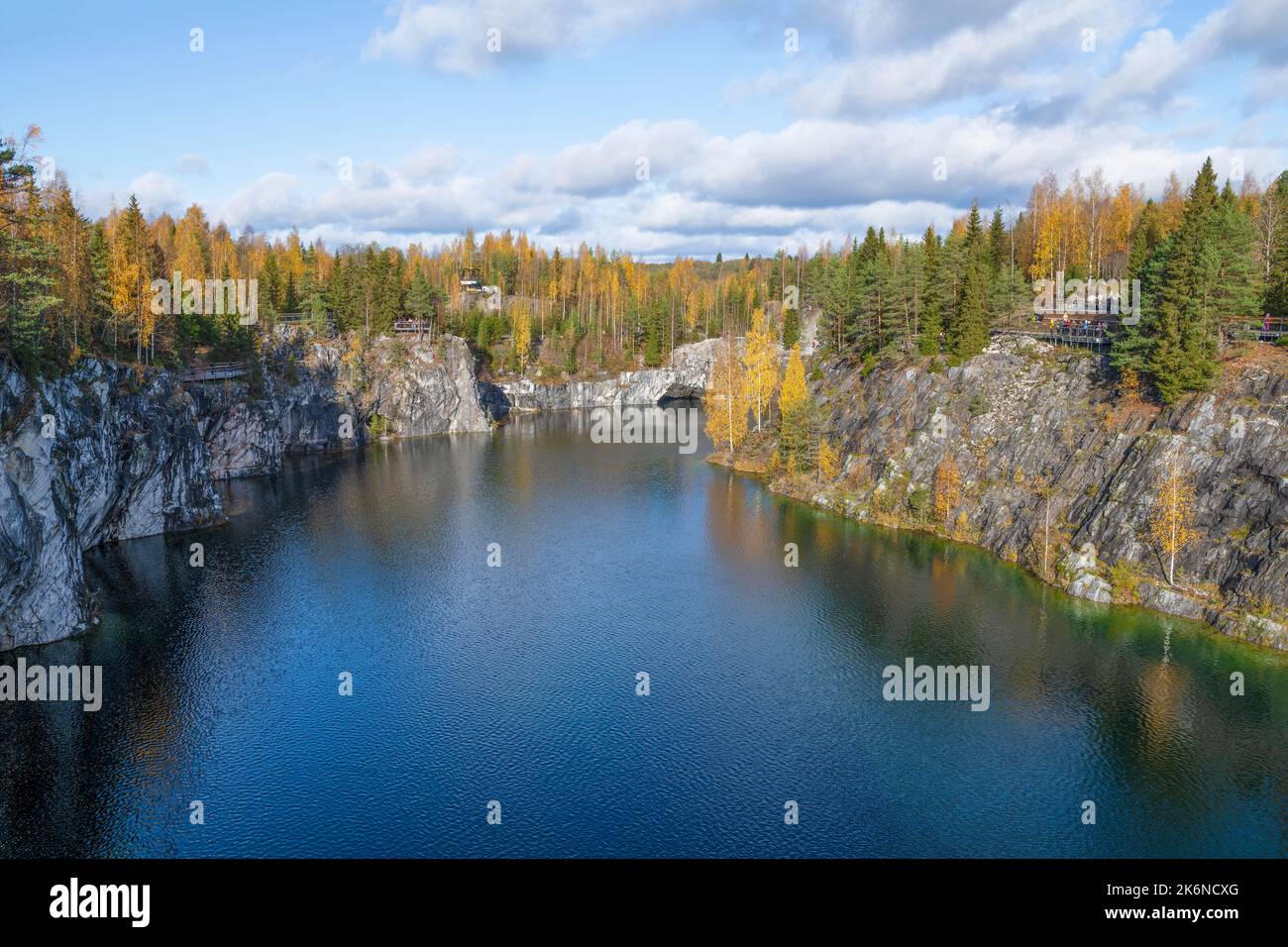 Marble canyon of Ruskeala mountain park in golden autumn. Karelia Stock ...