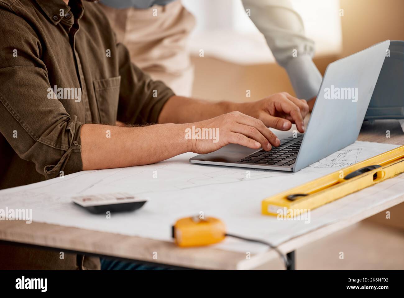 The renovation process is a team effort. two unrecognizable ...