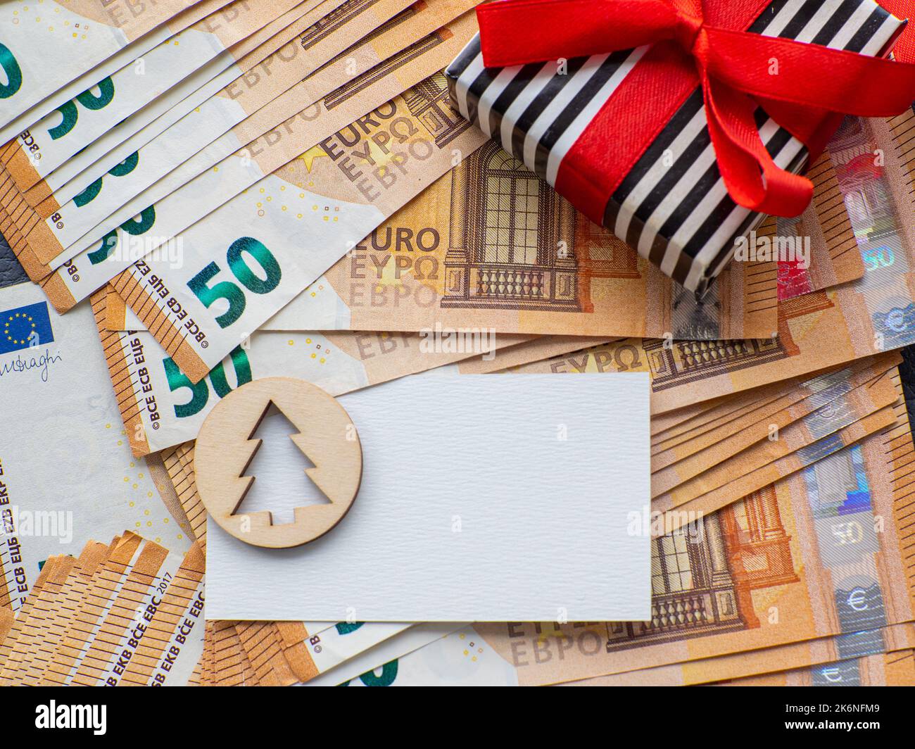 Copy space with christmas tree on the background of fifty euros ...
