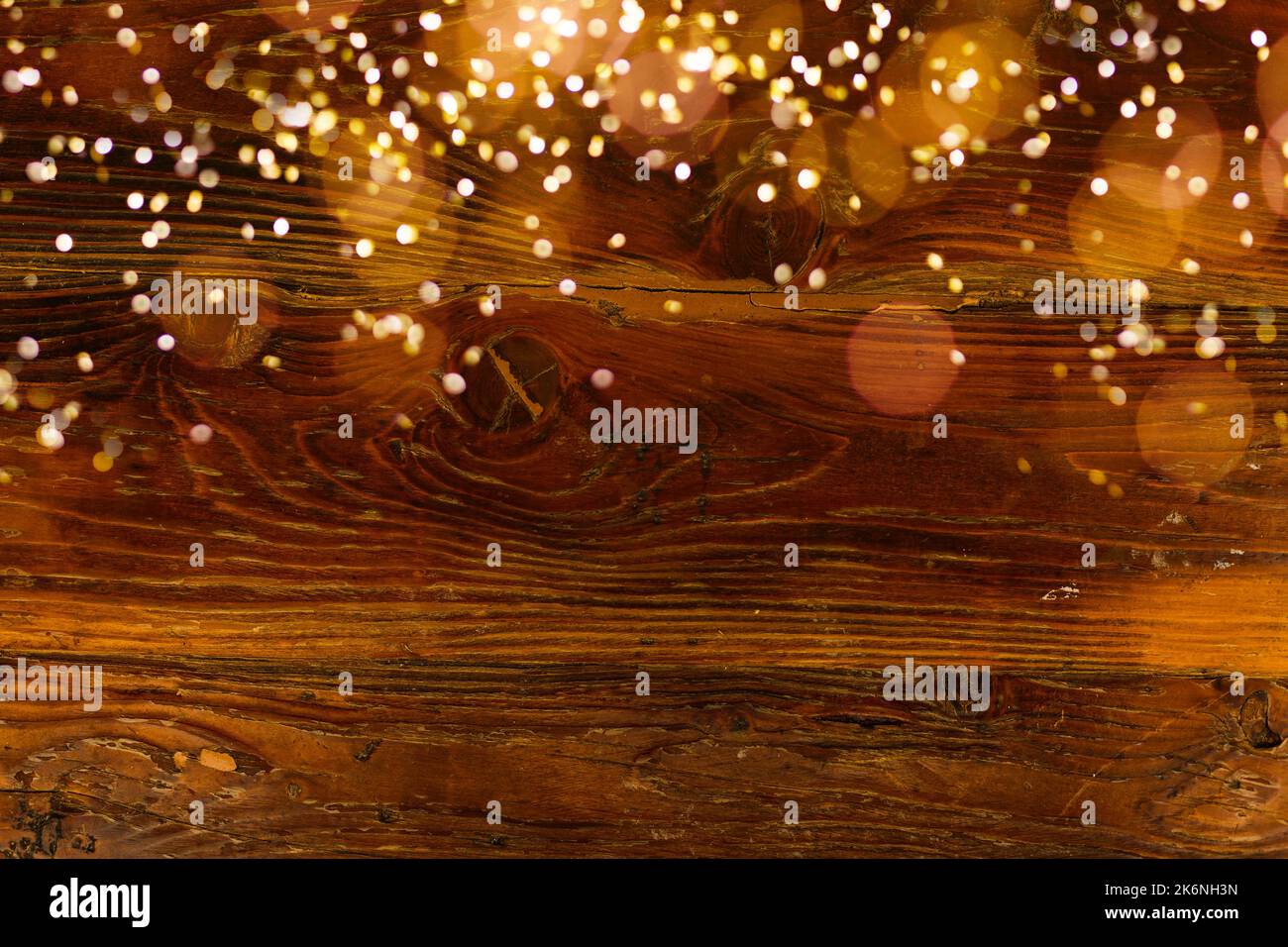 Christmas and New Year wooden background with light Stock Photo - Alamy