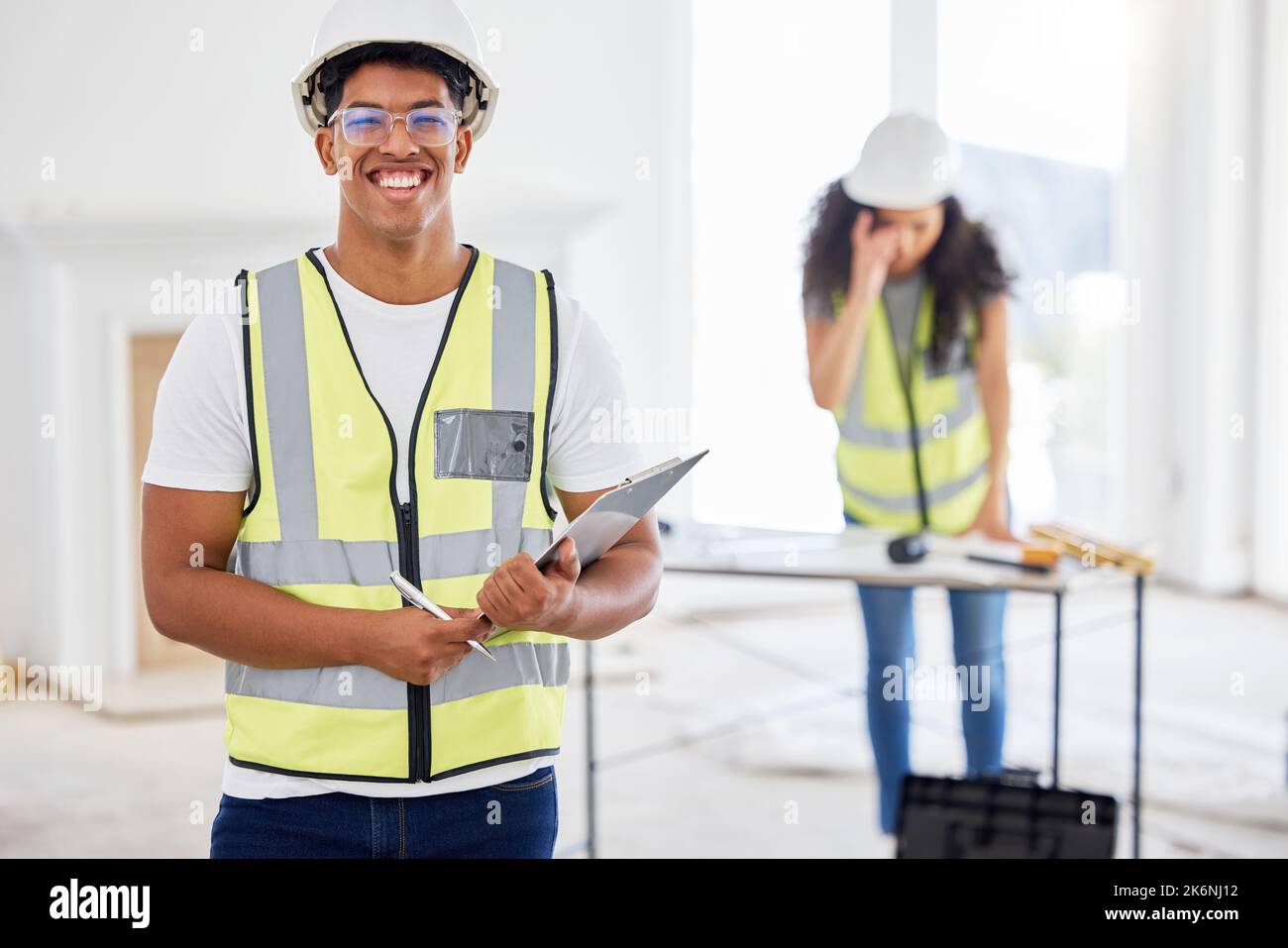 Were all set here. a handsome young contractor standing inside and ...