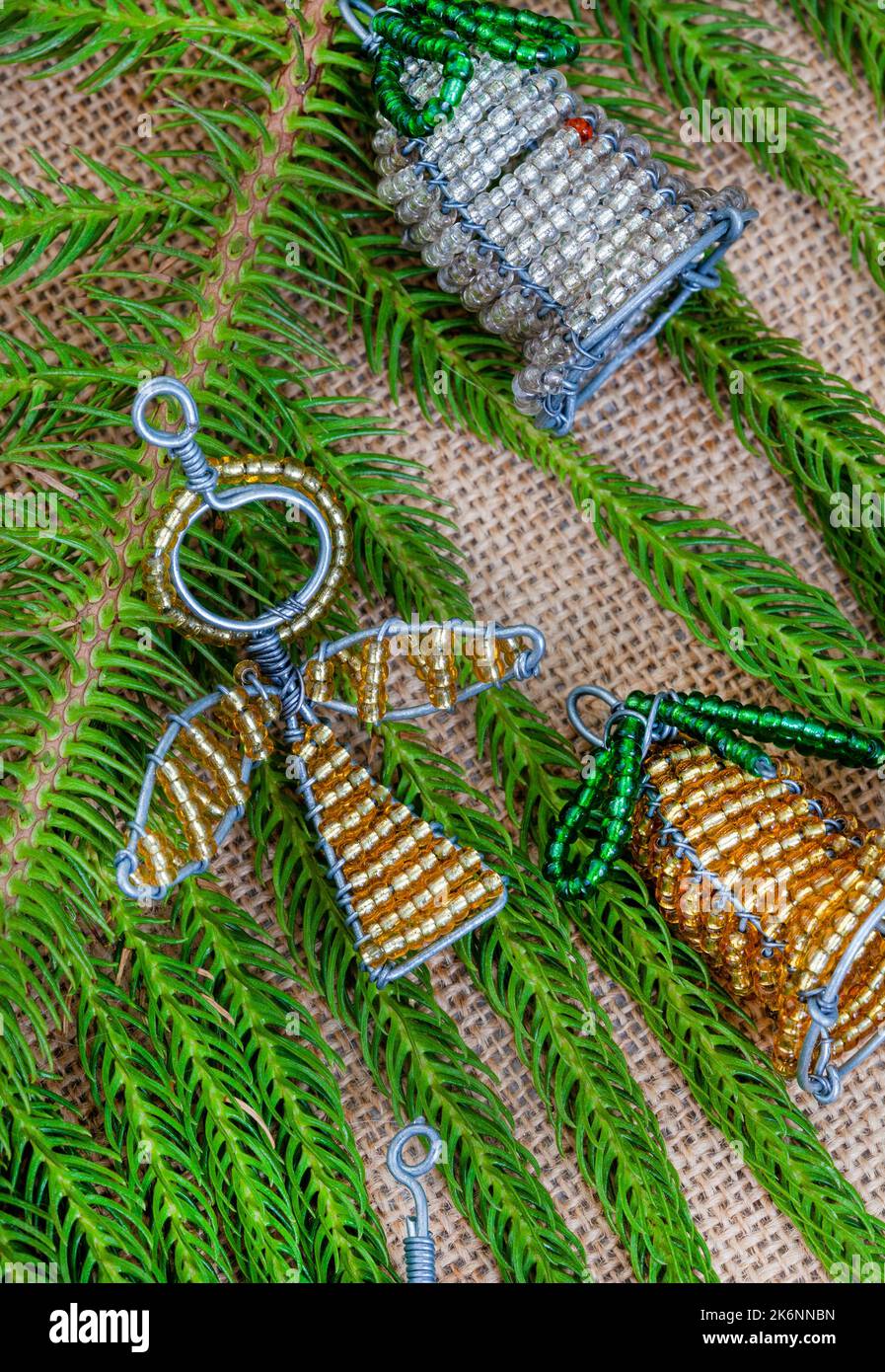 South African Beaded Christmas decorations with tree bits on rustic ...