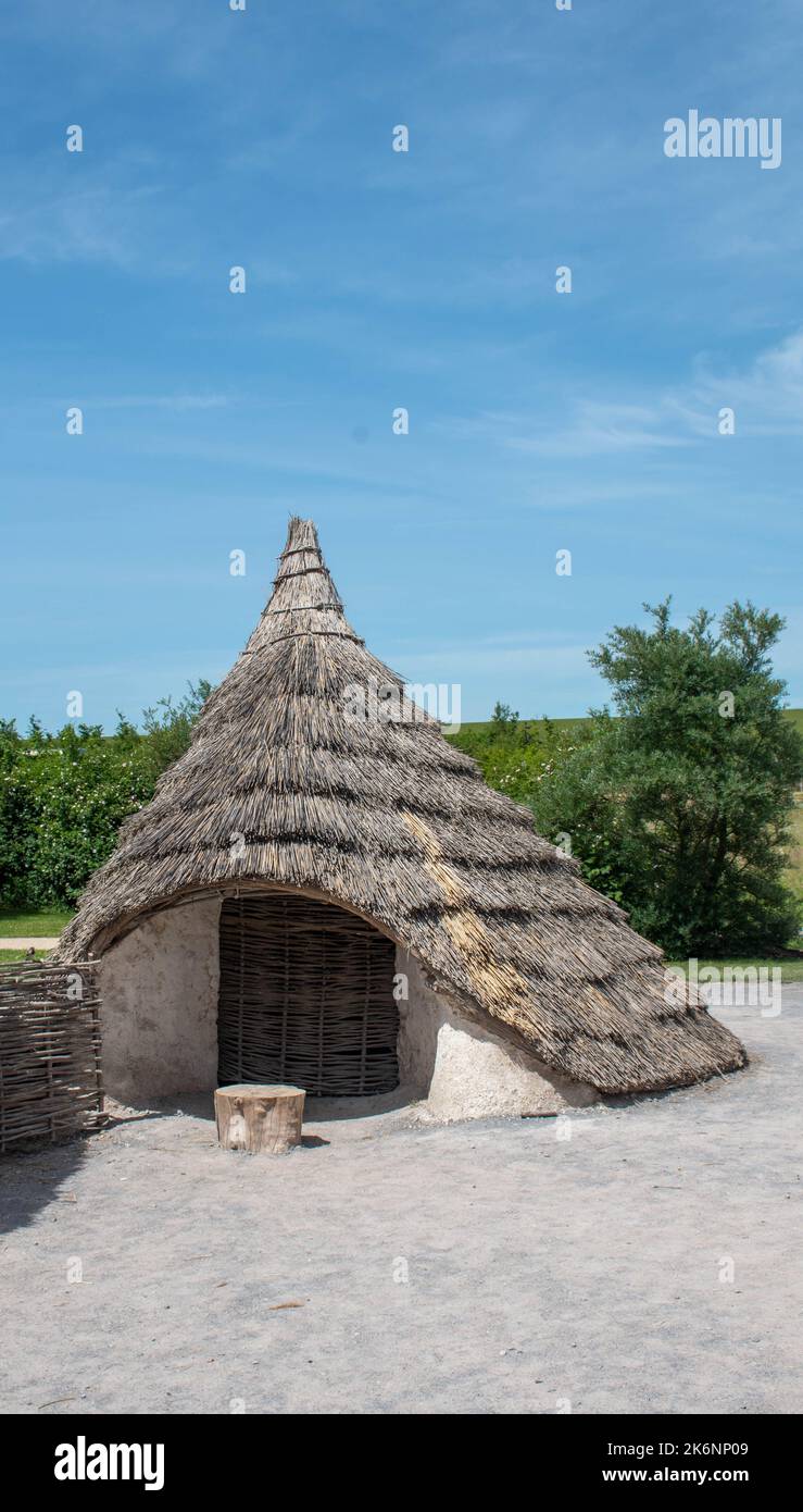 Stoneage wooden hut with roof Stock Photo - Alamy