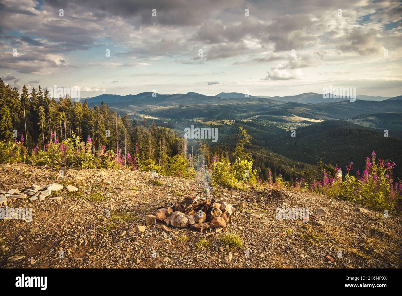 Campfire on top mountain green hi-res stock photography and images - Alamy