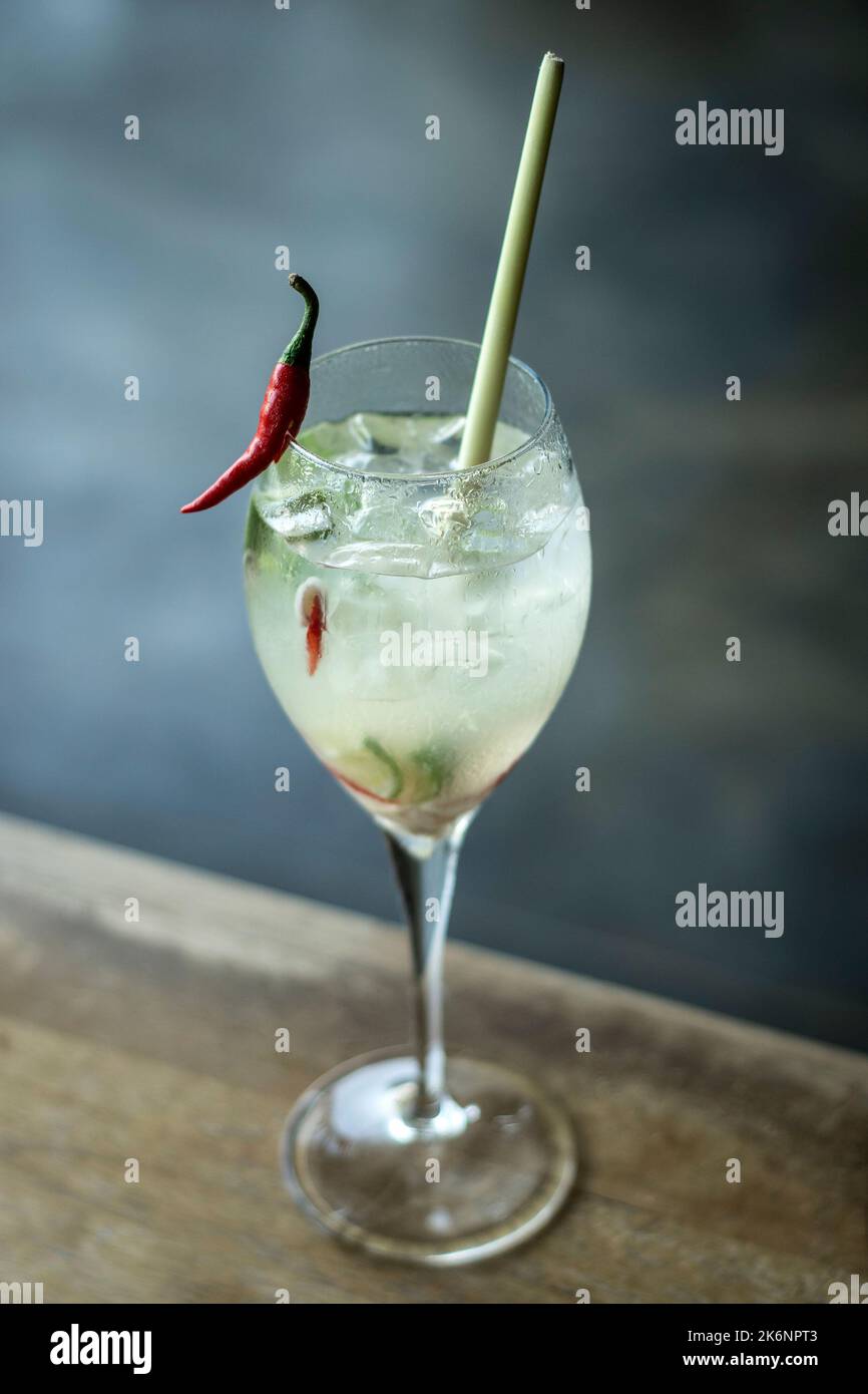 modern thai cocktail with rice wine, chilli pepper, lime and lemongrass ...