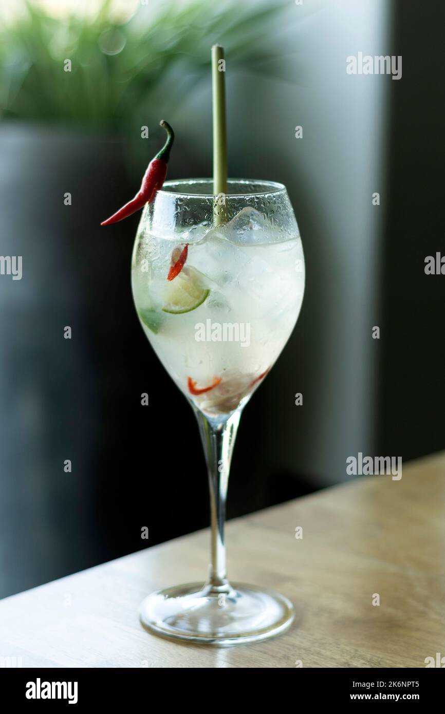 modern thai cocktail with rice wine, chilli pepper, lime and lemongrass ...