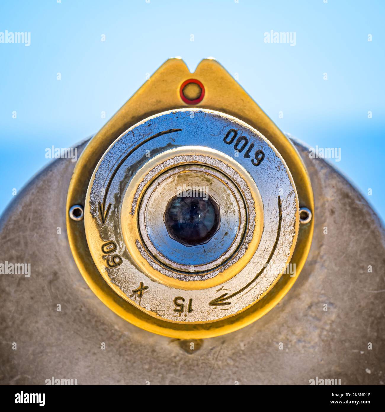 Close-up color image of the brass colored eyepiece and aiming device of ...