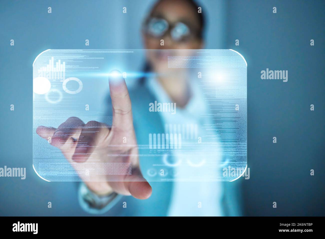 I work better at night. an unrecognisable businesswoman standing alone ...