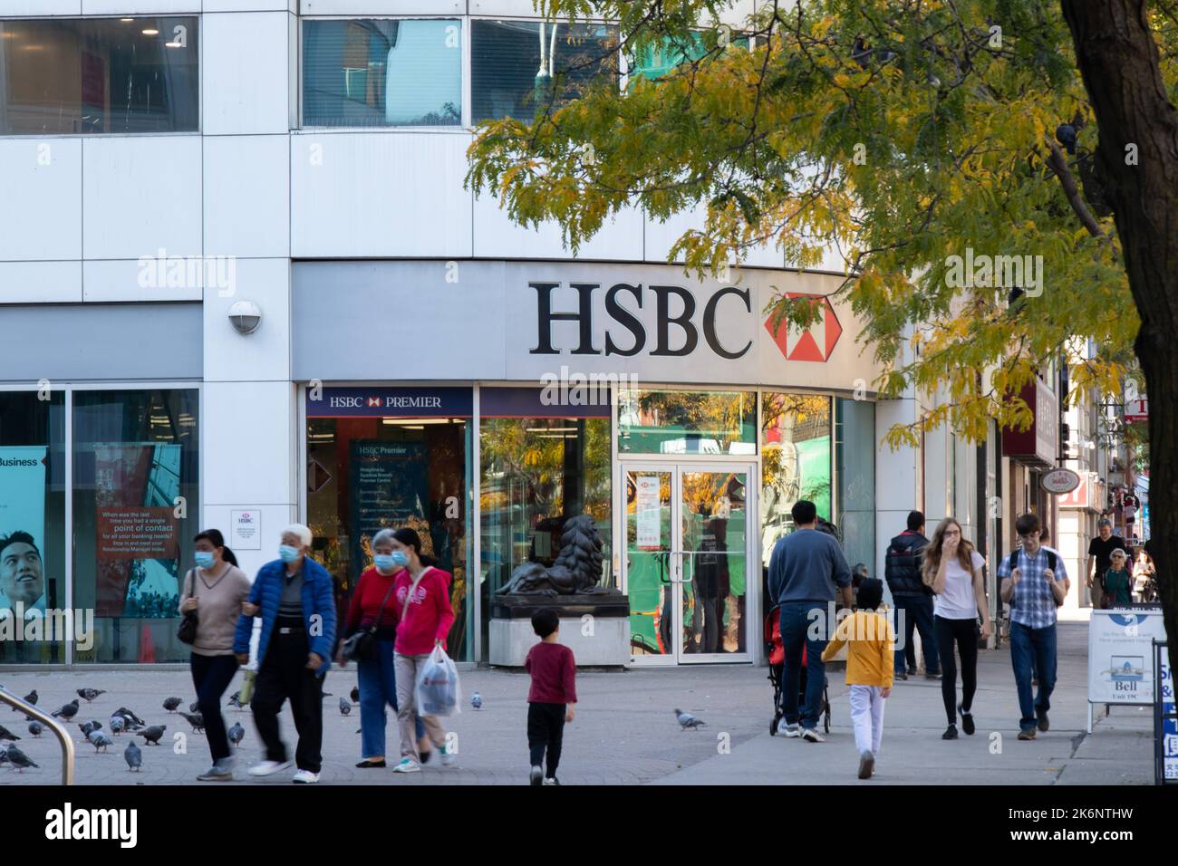 People walk by an HSBC bank branch in downtown Toronto; HSBC Holdings ...
