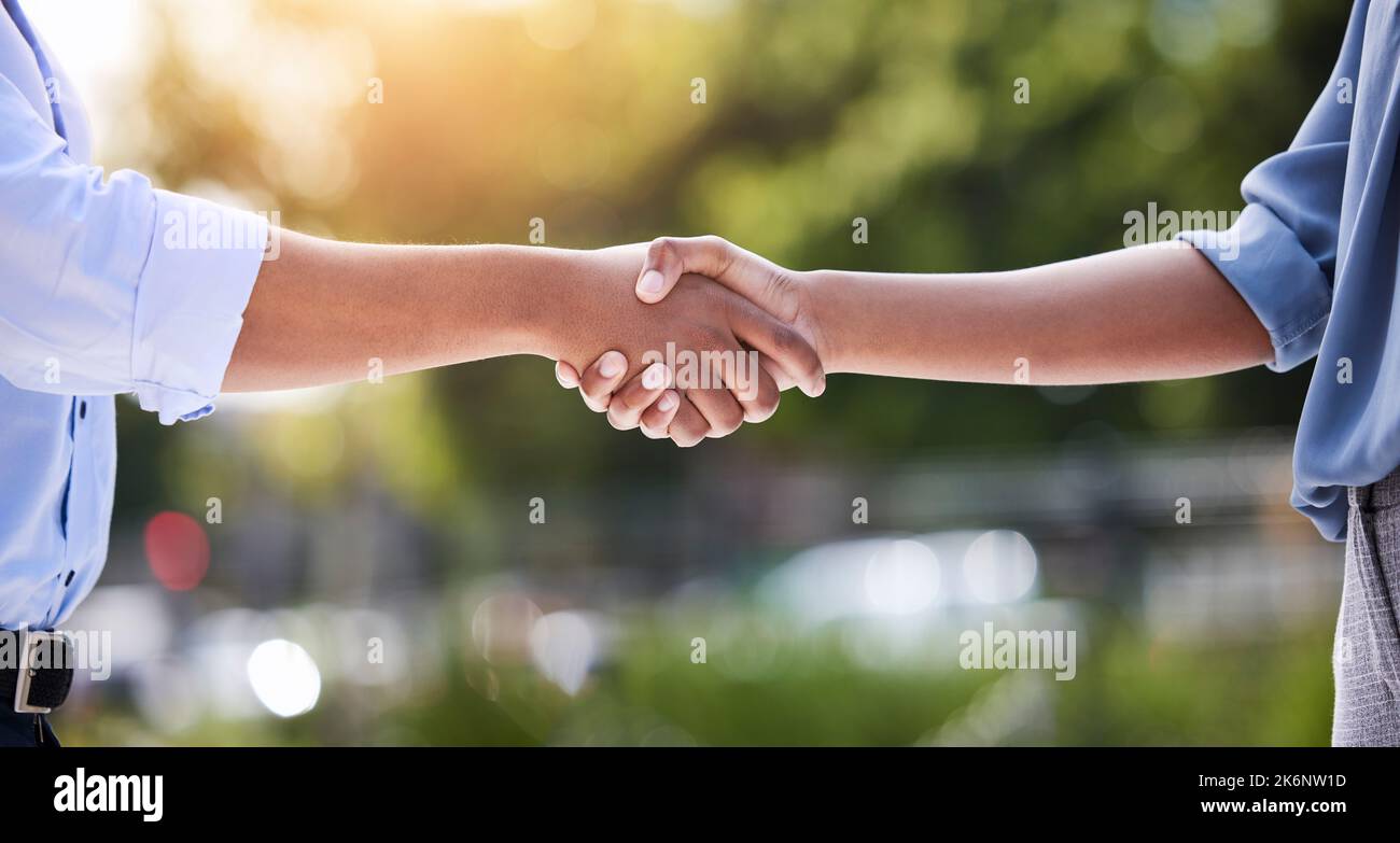 Starting off with a handshake. two unrecognizable people shaking hands ...