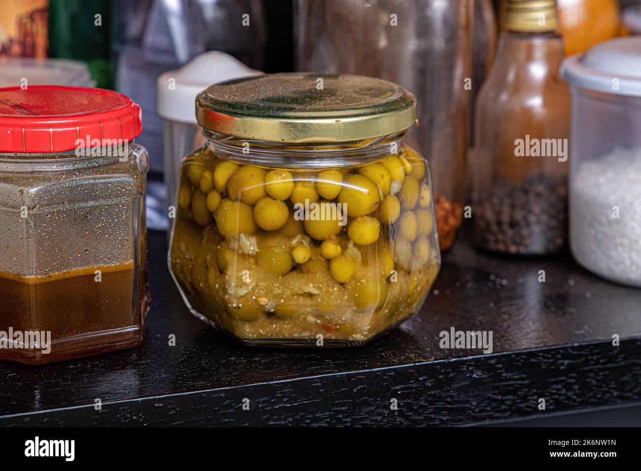 glass jar with golden lid with canned jurubeba fruits inside Stock ...