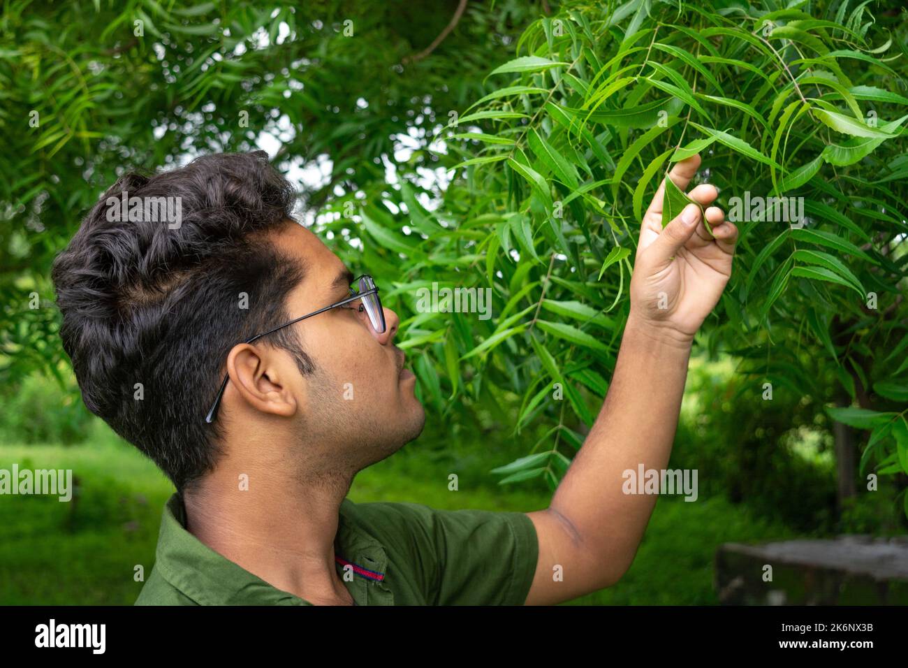 TIKAMGARH, MADHYA PRADESH, INDIA - AUGUST 11, 2022: Young boy observing ...