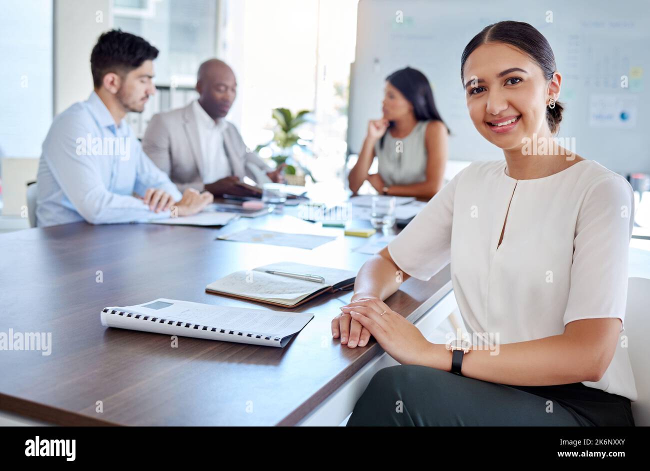 Leader, portrait and woman at meeting table for sales growth, marketing ...